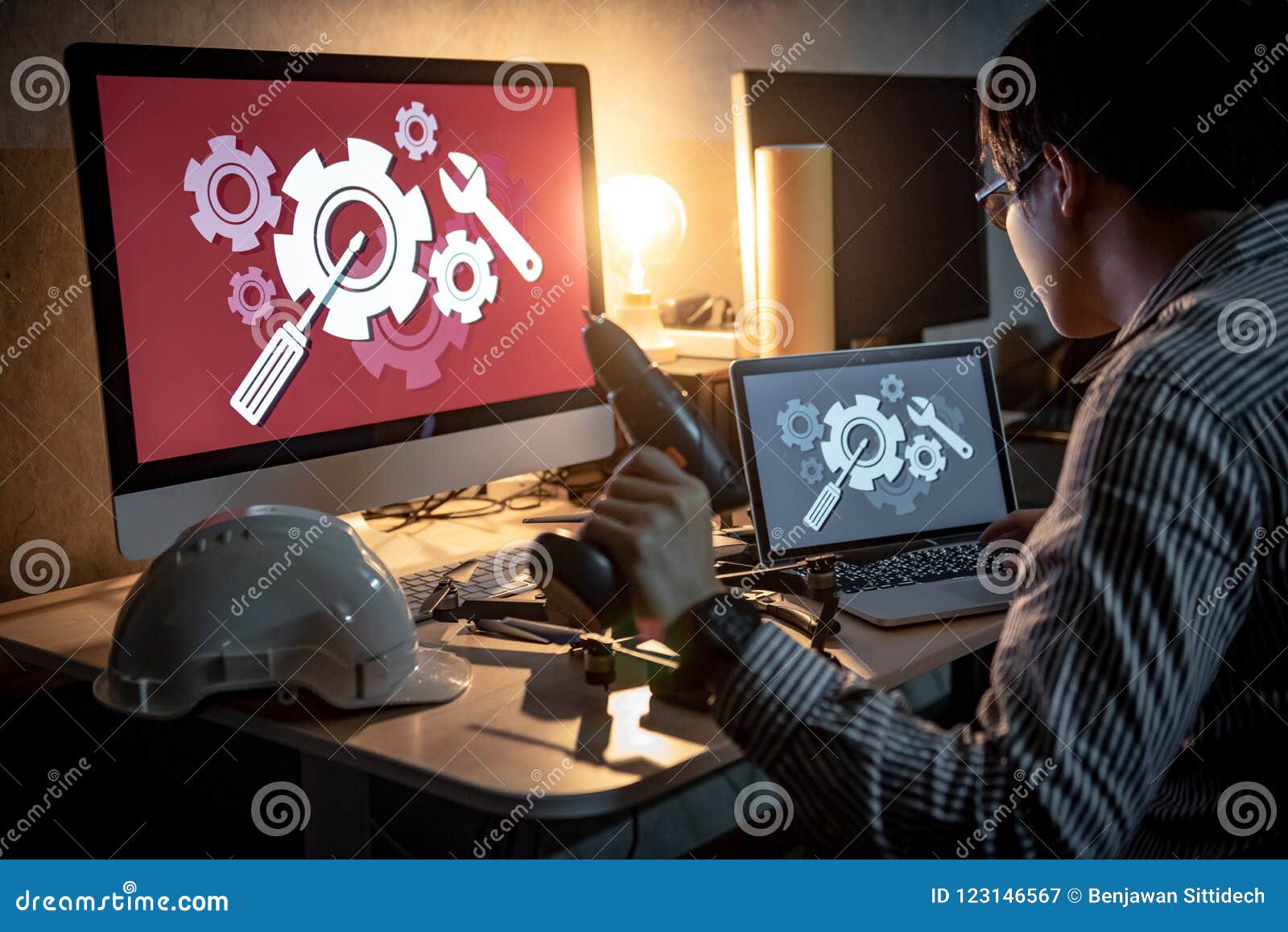 Asian Technical Engineer Using Screwdriver for Repairing Drone Stock ...