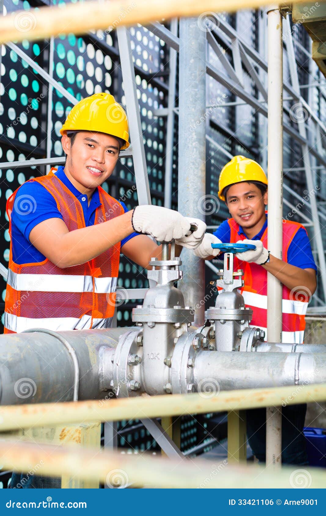 Asian Technicians or Engineers Working on Valve Stock Photo - Image of ...