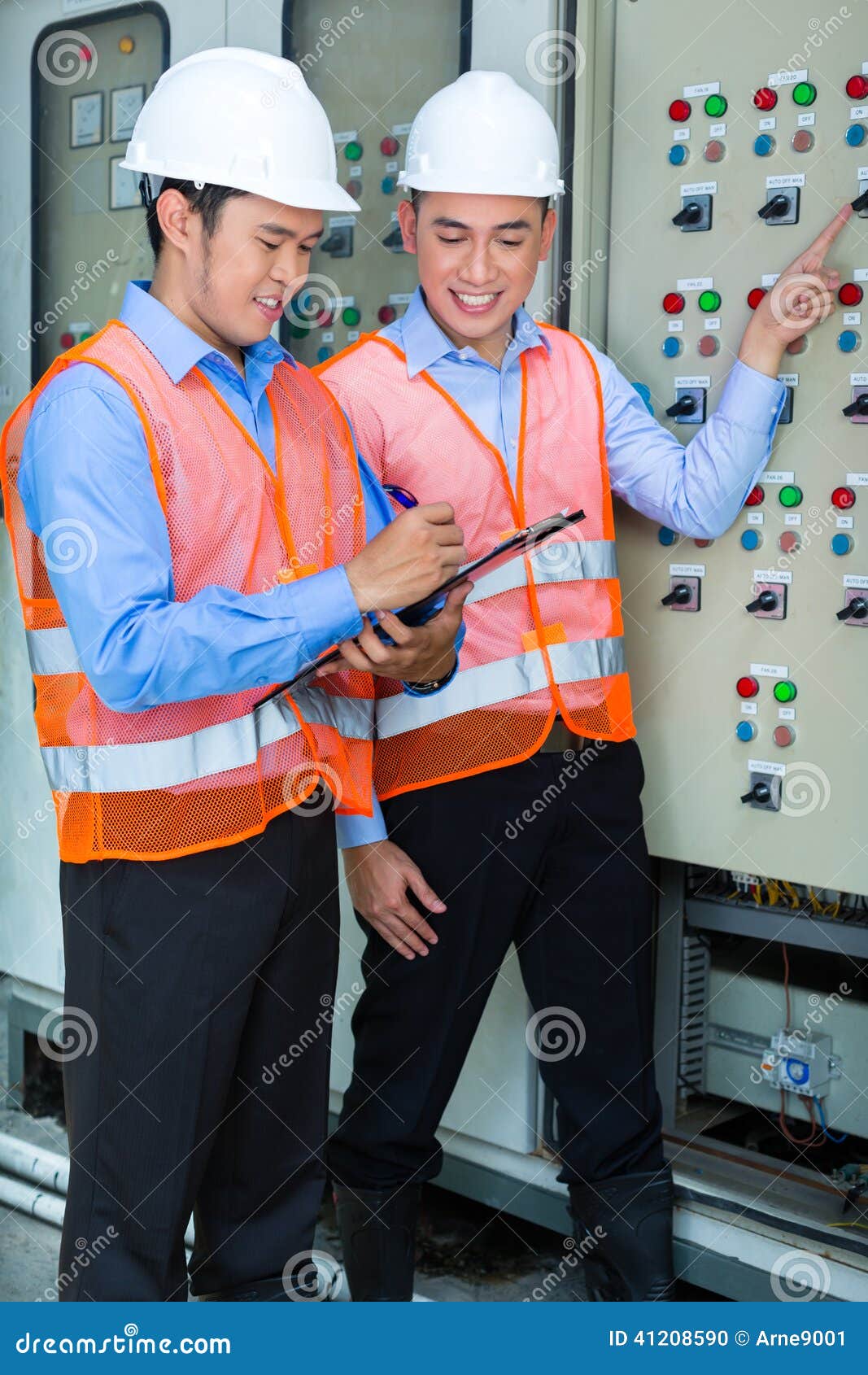 Asian Technicians Install Panels Solar Cells To Produce And Distribute ...