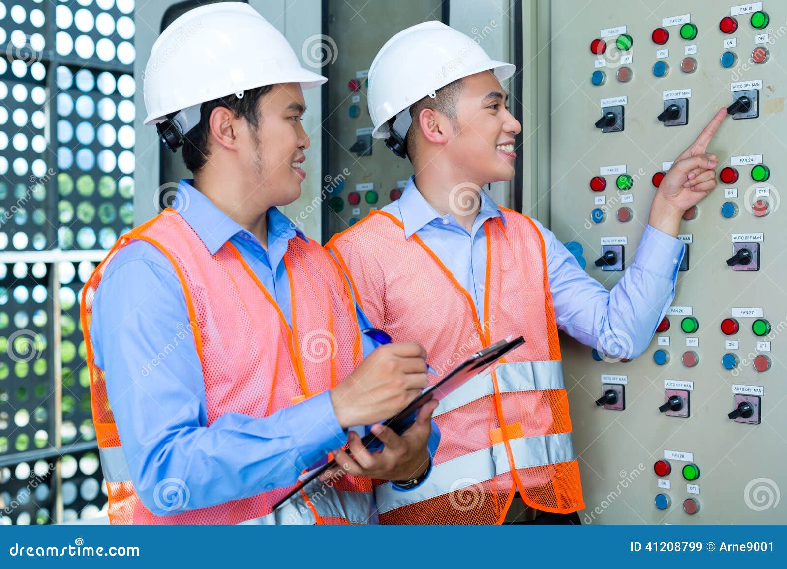Asian Technicians at Panel on Construction Site Stock Image - Image of ...