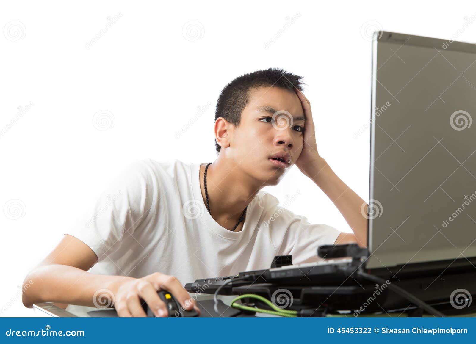 Asian Teenager Using Computer with Boring Face Stock Photo - Image of ...
