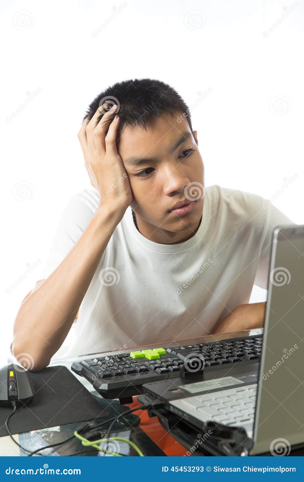 Asian Teenager Using Computer with Boring Face Stock Image - Image of ...