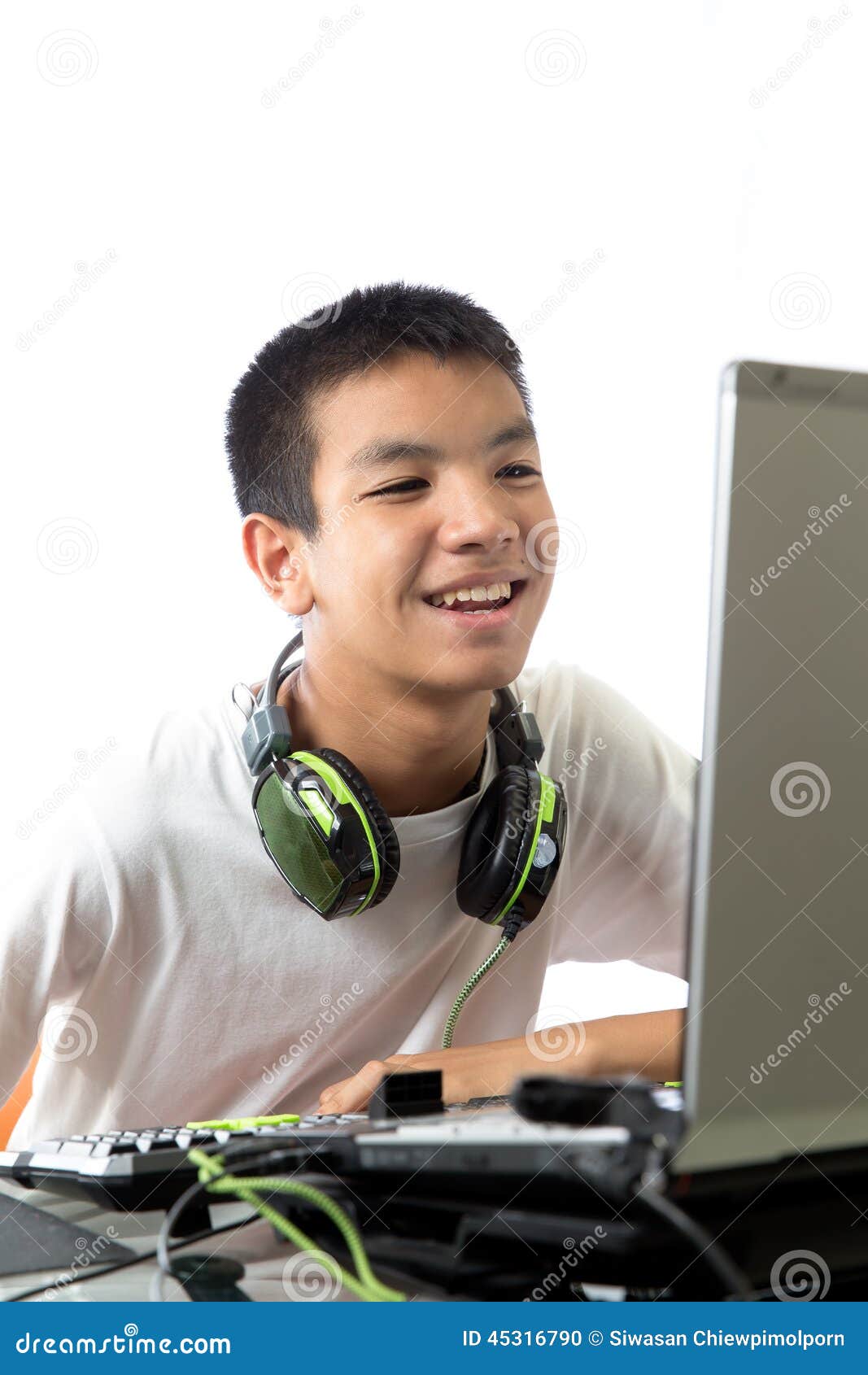 Asian Teenager Using Computer with Smily Face Stock Photo - Image of ...