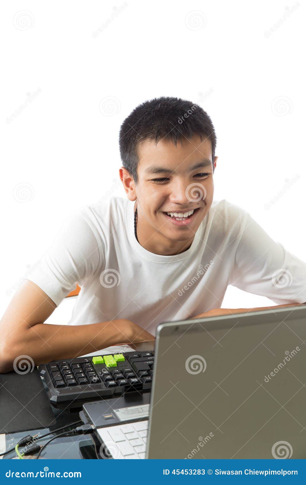 Asian Teenager Using Computer with Smily Face Stock Image - Image of ...