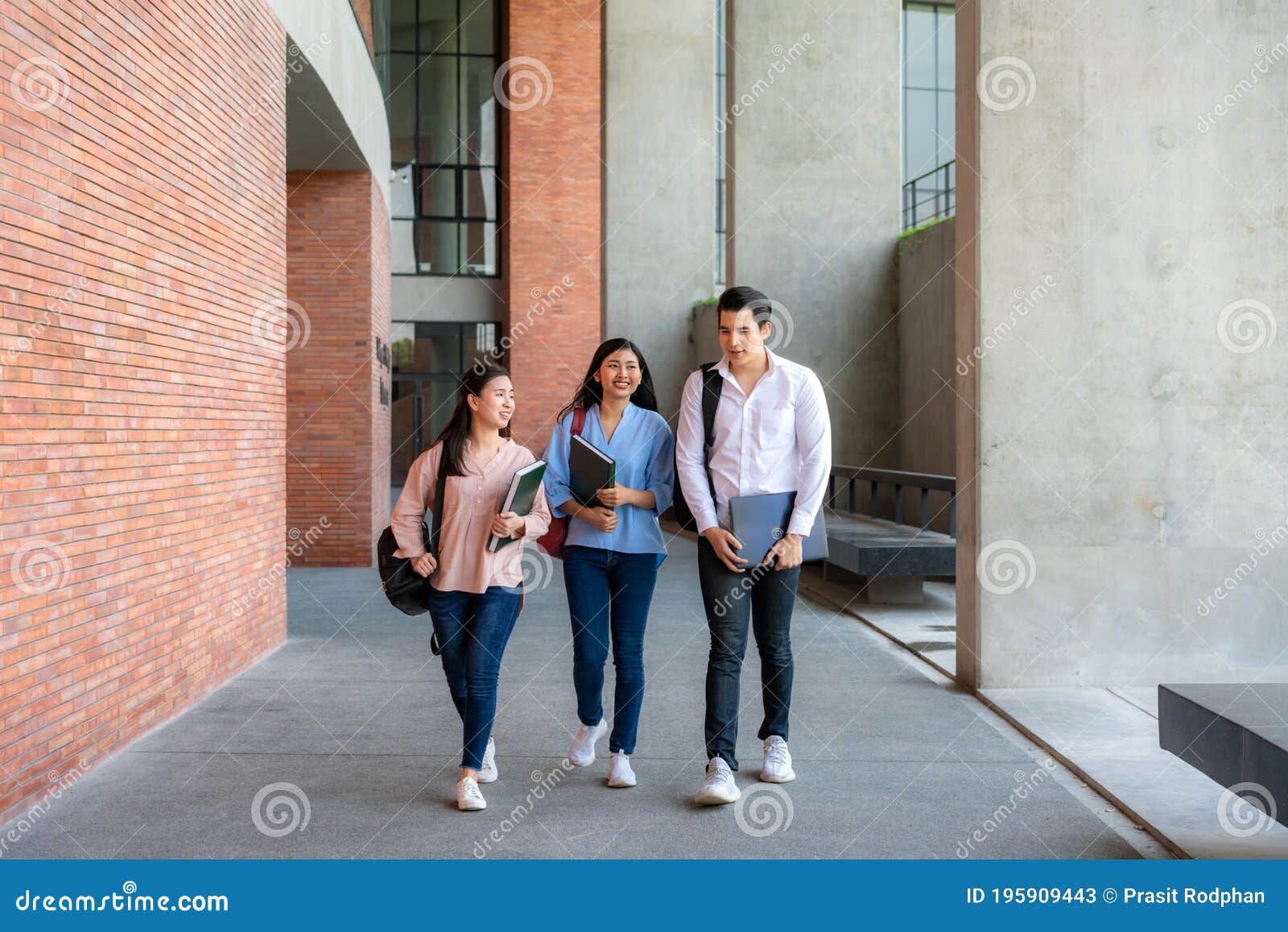 Asian Three Students are Walking and Talking Together in University ...