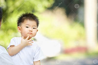Asian toddler thinking stock image. Image of asian, outdoor - 10548113
