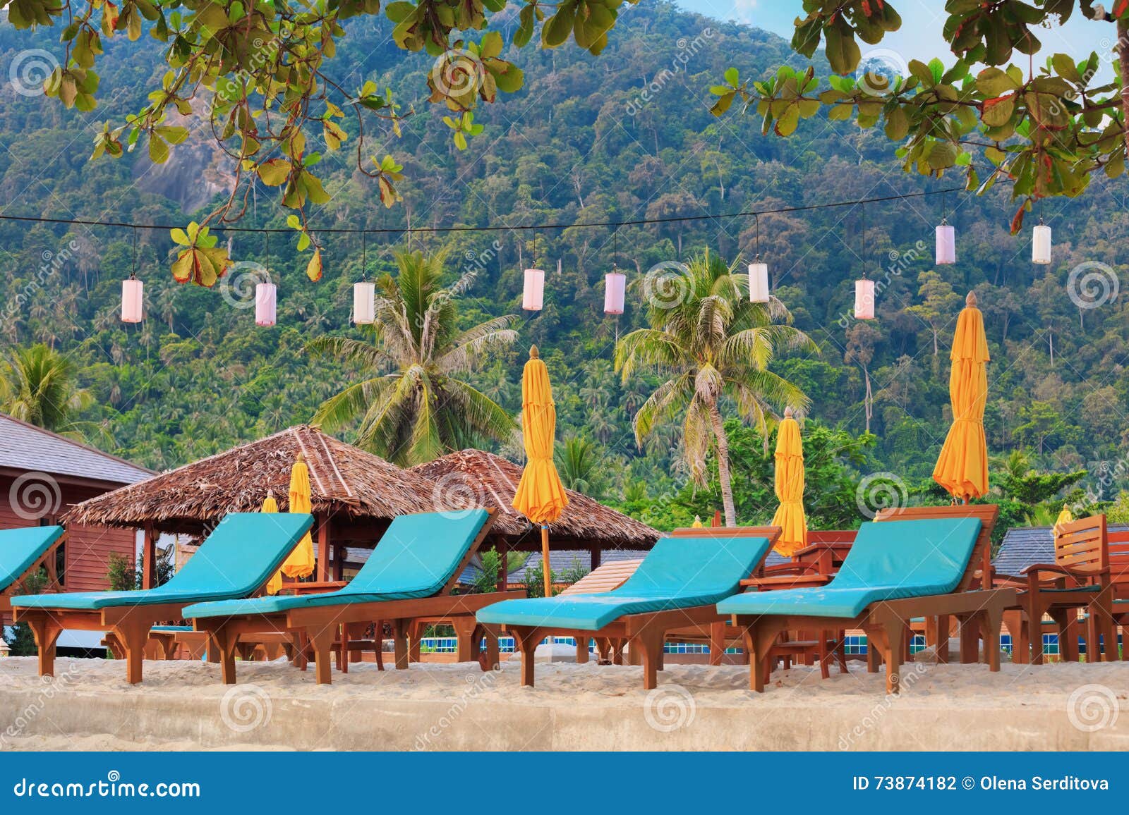 Asian Tropical Beach with Sunbeds Under Trees, Thailand Stock Photo ...