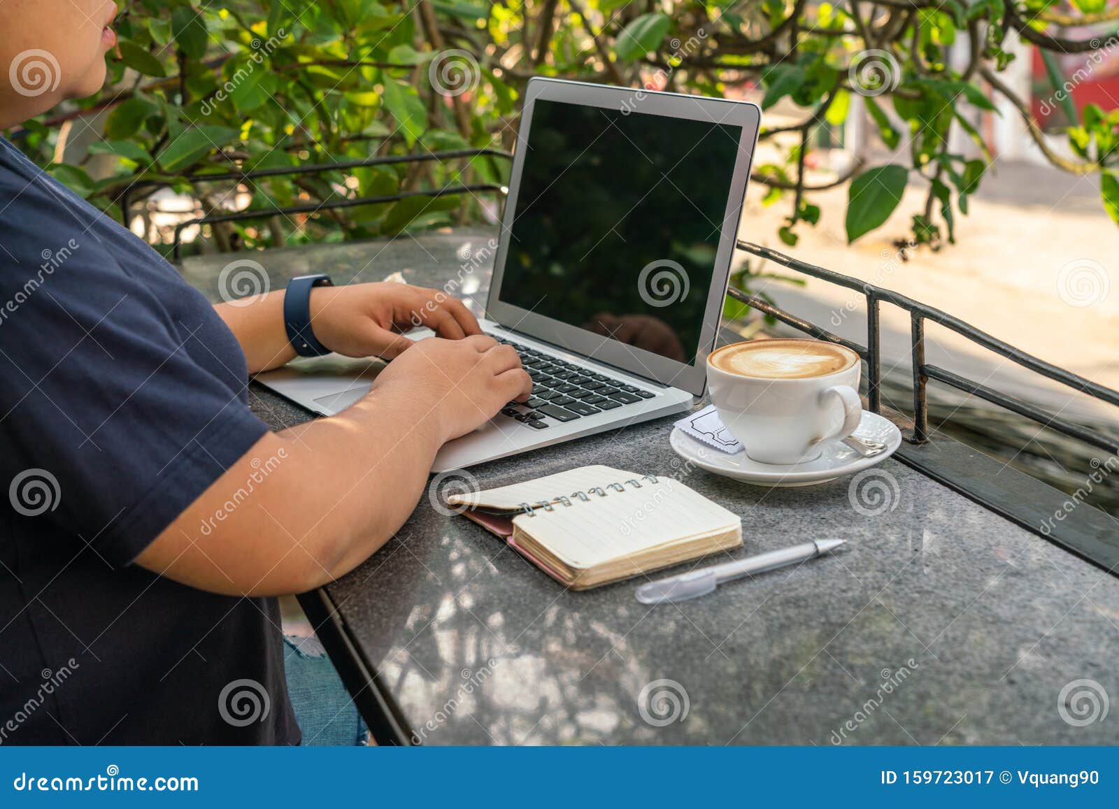 Asian Using Laptop while Enjoying Coffee at Outdoor Cafeteria Stock ... Asian Using Laptop while Enjoying Coffee at Outdoor Cafeteria Stock ...