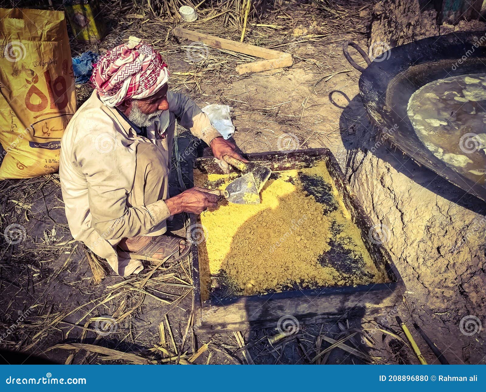 An Asian Villager Man is Making Raw Sugar. Editorial Image - Image of ...