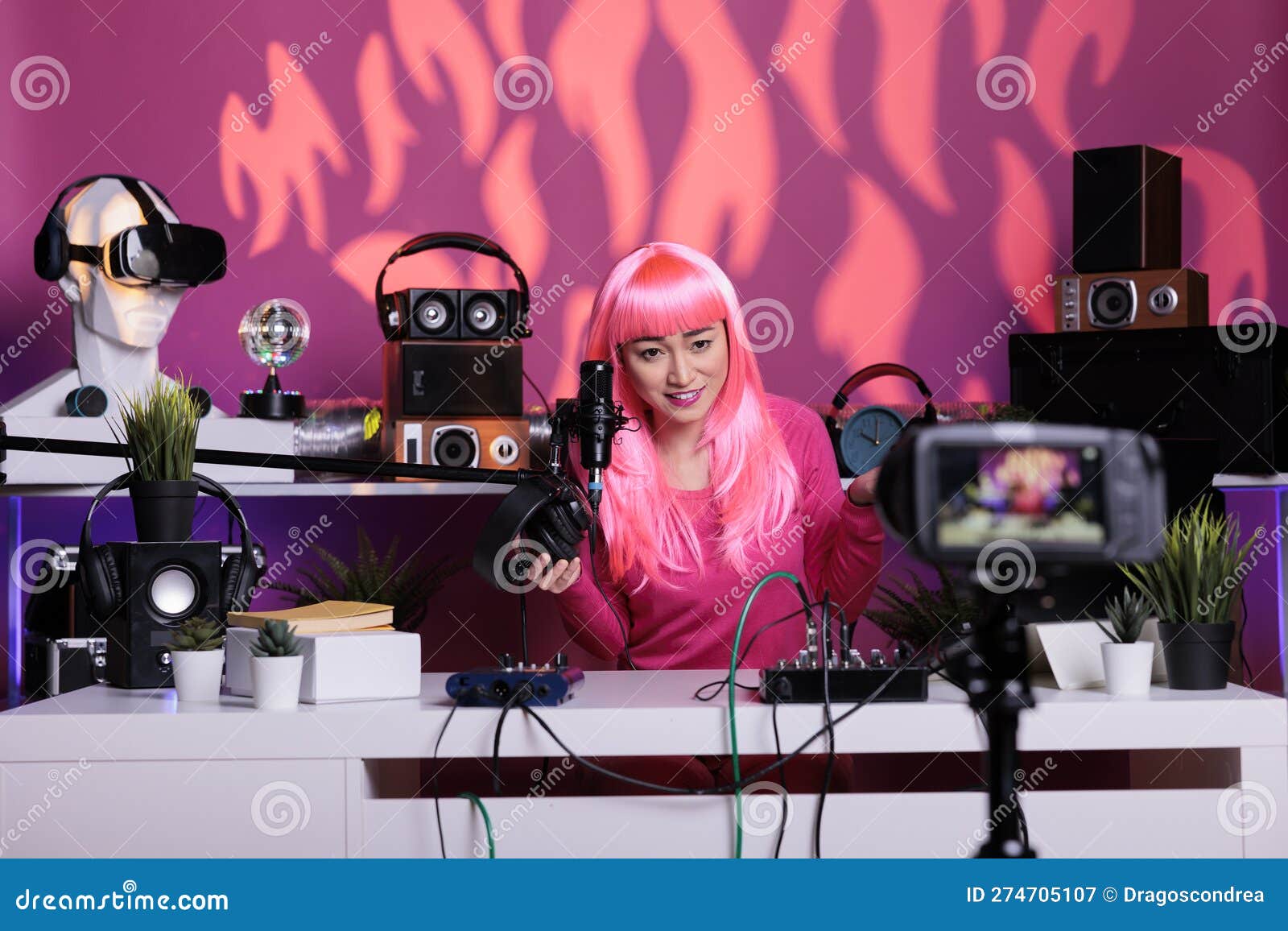 Asian Vlogger Looking into Camera while Recording Creative Podcast in ...