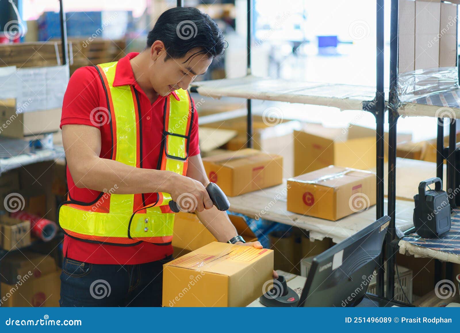 Asian Warehouse Man Worker with Computer and Barcode Scanner in ...