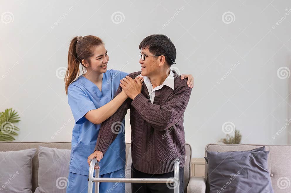 Asian Woman Caregiver Helping Senior Man Walking Nurse Assisting He