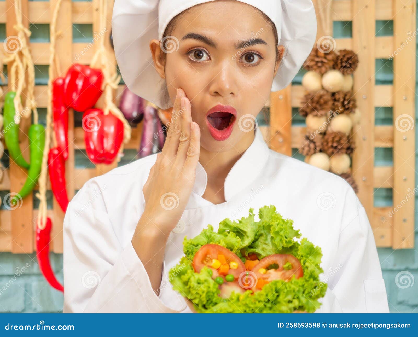 Asian Woman in Chef`s Uniform is Cooking in the Kitchen Stock Photo ...
