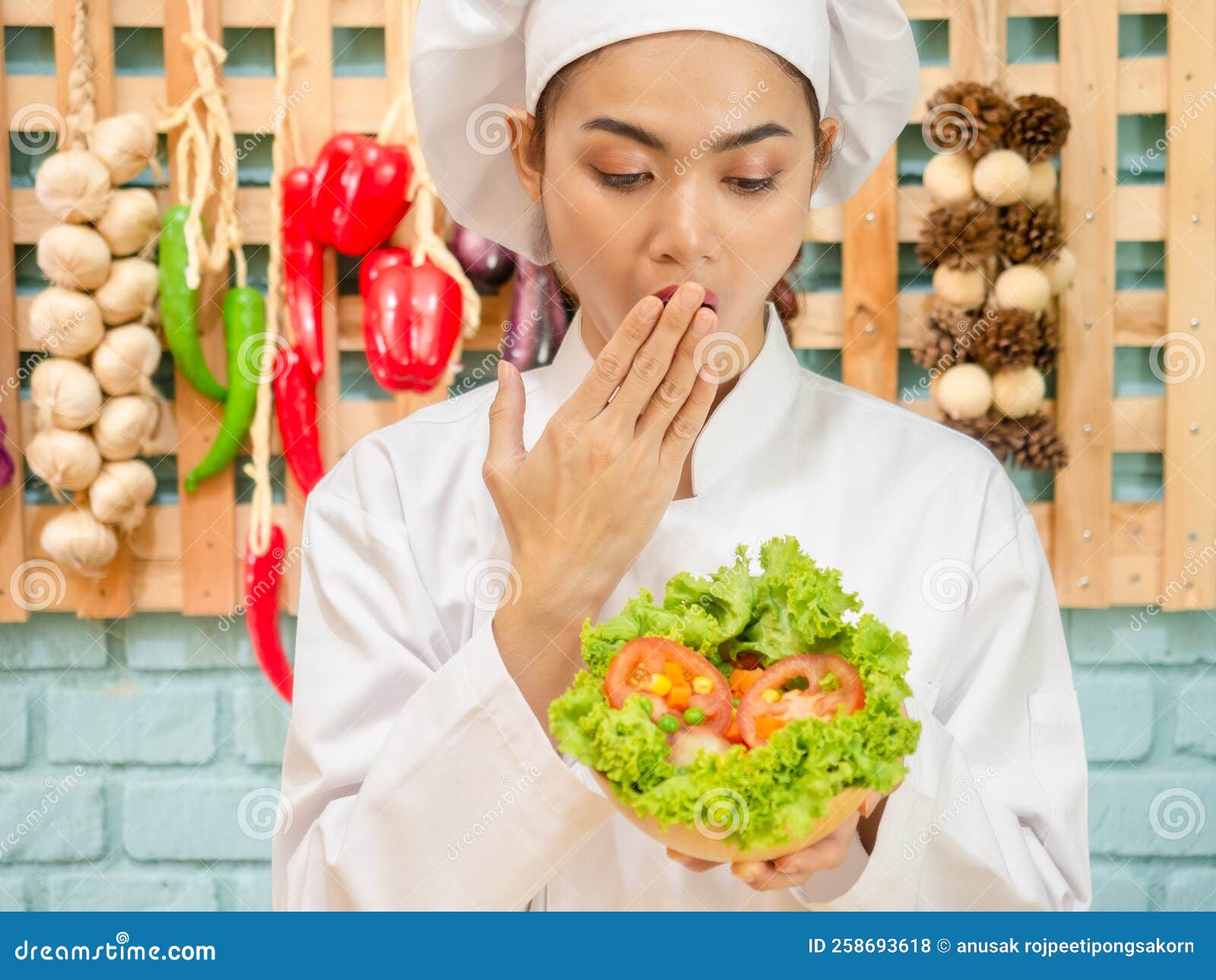 Asian Woman in Chef`s Uniform is Cooking in the Kitchen Stock Photo ...
