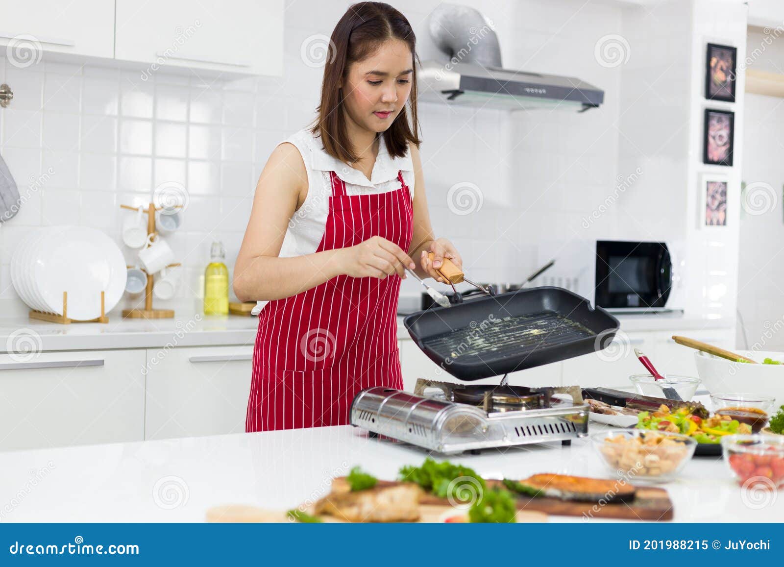 Asian Woman Cooking in Modern Kitchen Stock Image - Image of kitchen ...