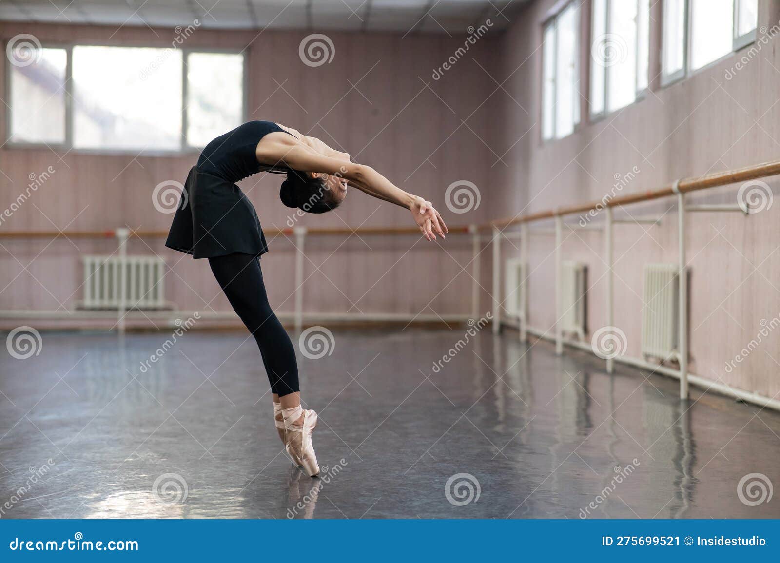 Asian Woman Dancing in Ballet Class. Bending in the Back. Stock Image ...