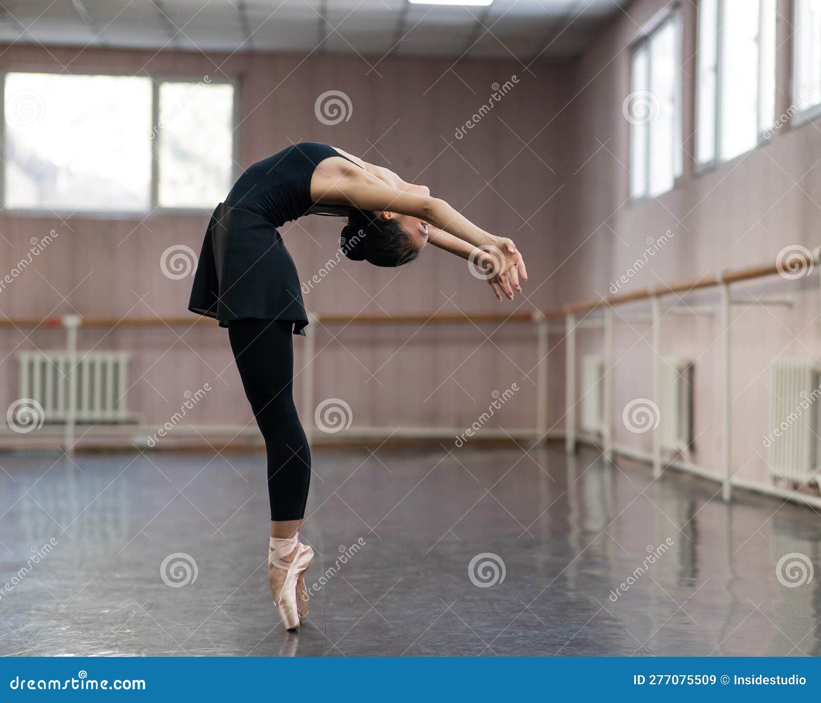 Asian Woman Dancing in Ballet Class. Bending in the Back. Stock Image ...