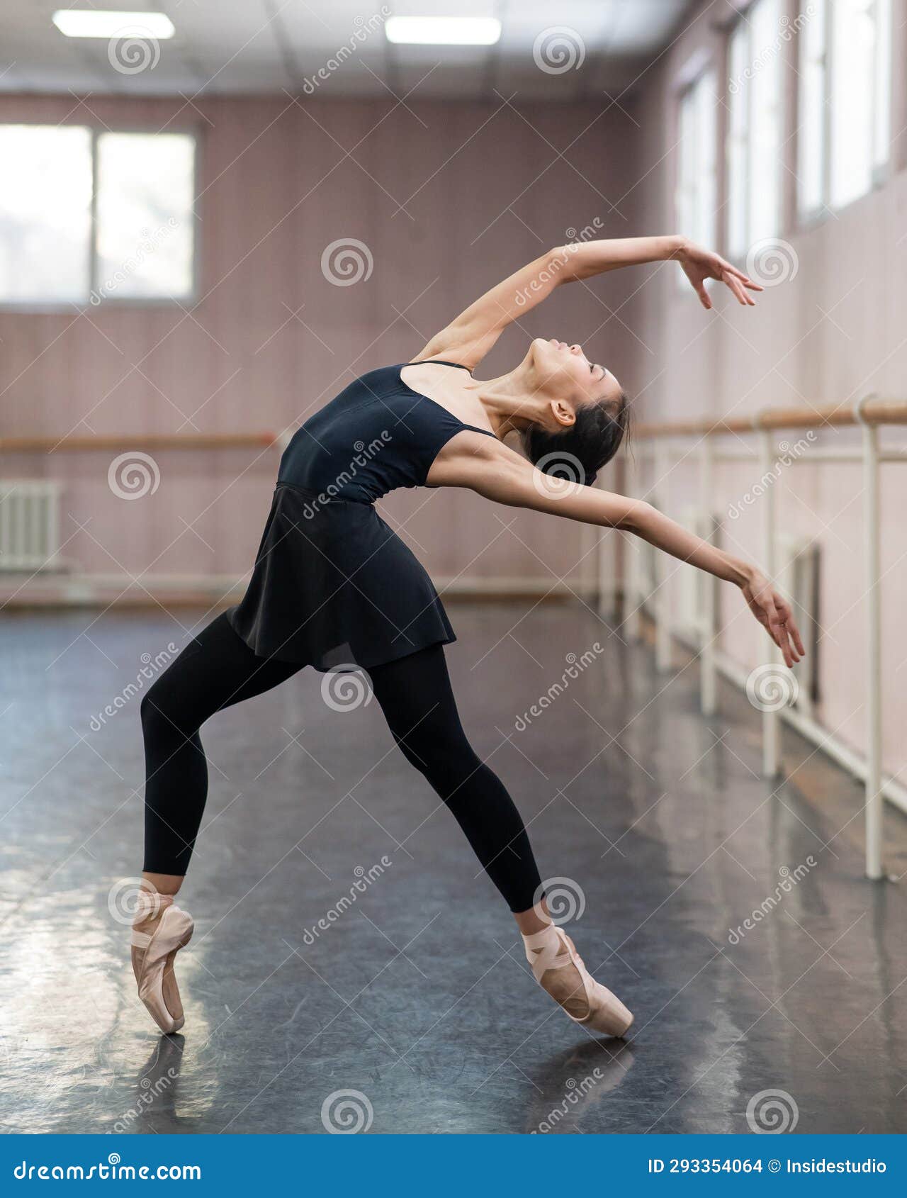 Asian Woman Dancing in Ballet Class. Bending in the Back. Stock Photo ...