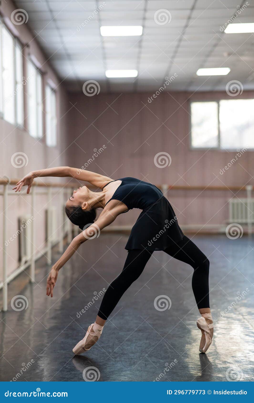 Asian Woman Dancing in Ballet Class. Bending in the Back. Stock Image ...