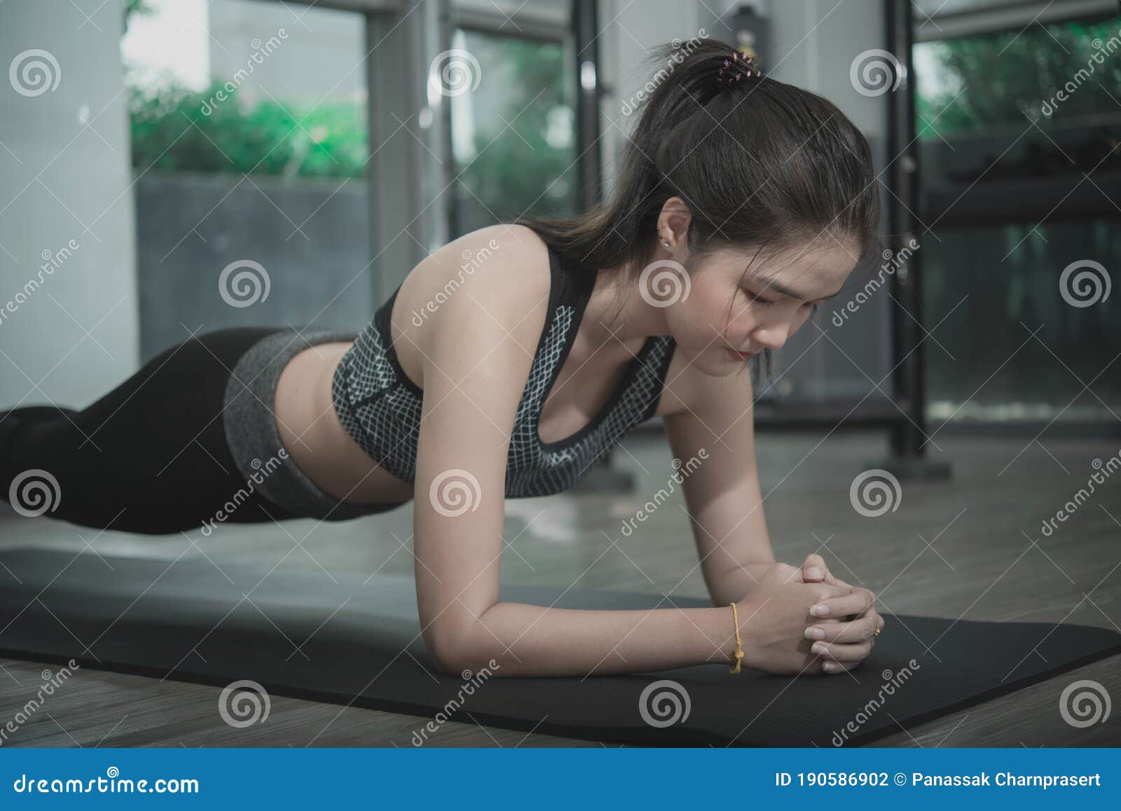 Asian Woman Doing Plank Exercise in Gym Stock Photo - Image of black ...
