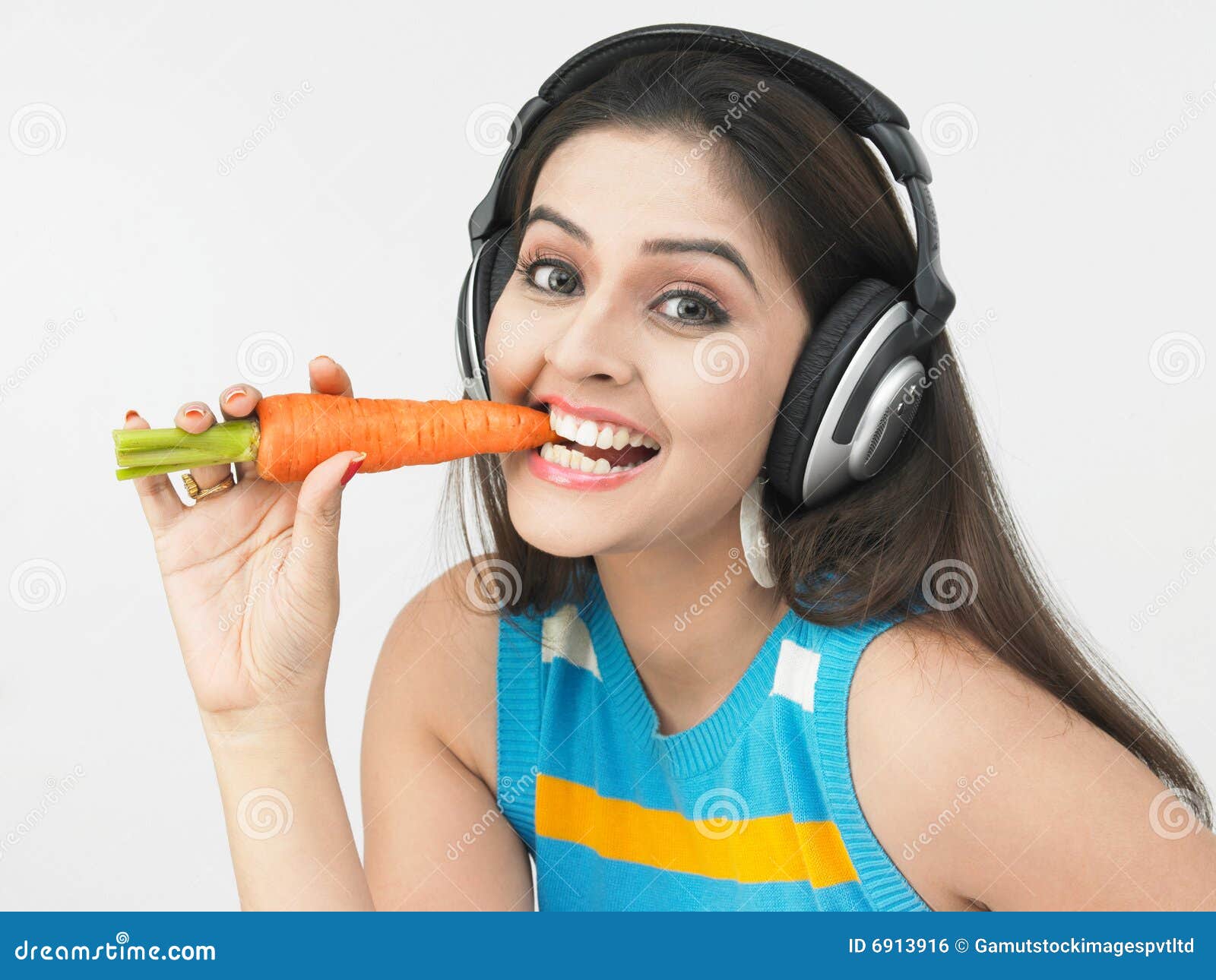 Asian Woman Eating a Carrot Stock Photo - Image of lady, health: 6913916