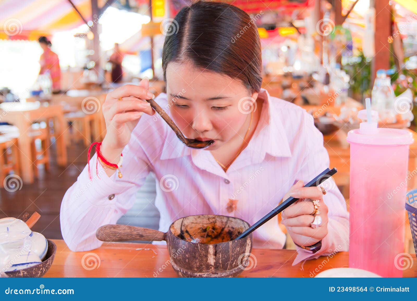 Asian woman eating noodle stock photo. Image of food - 23498564