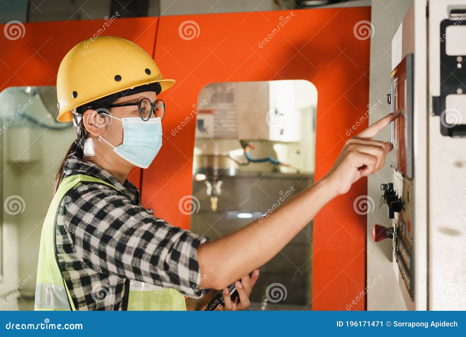 Asian Woman Engineer Working on Machine Control Panel Display and ...