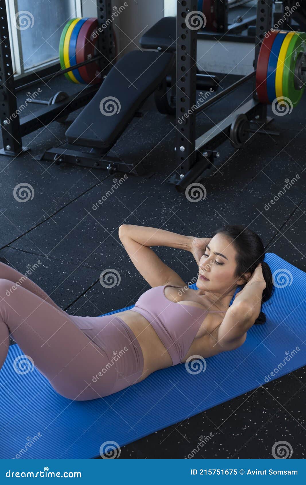 Asian Woman In Fitness Sport Gym Woman Exercising In The Gym Keeping
