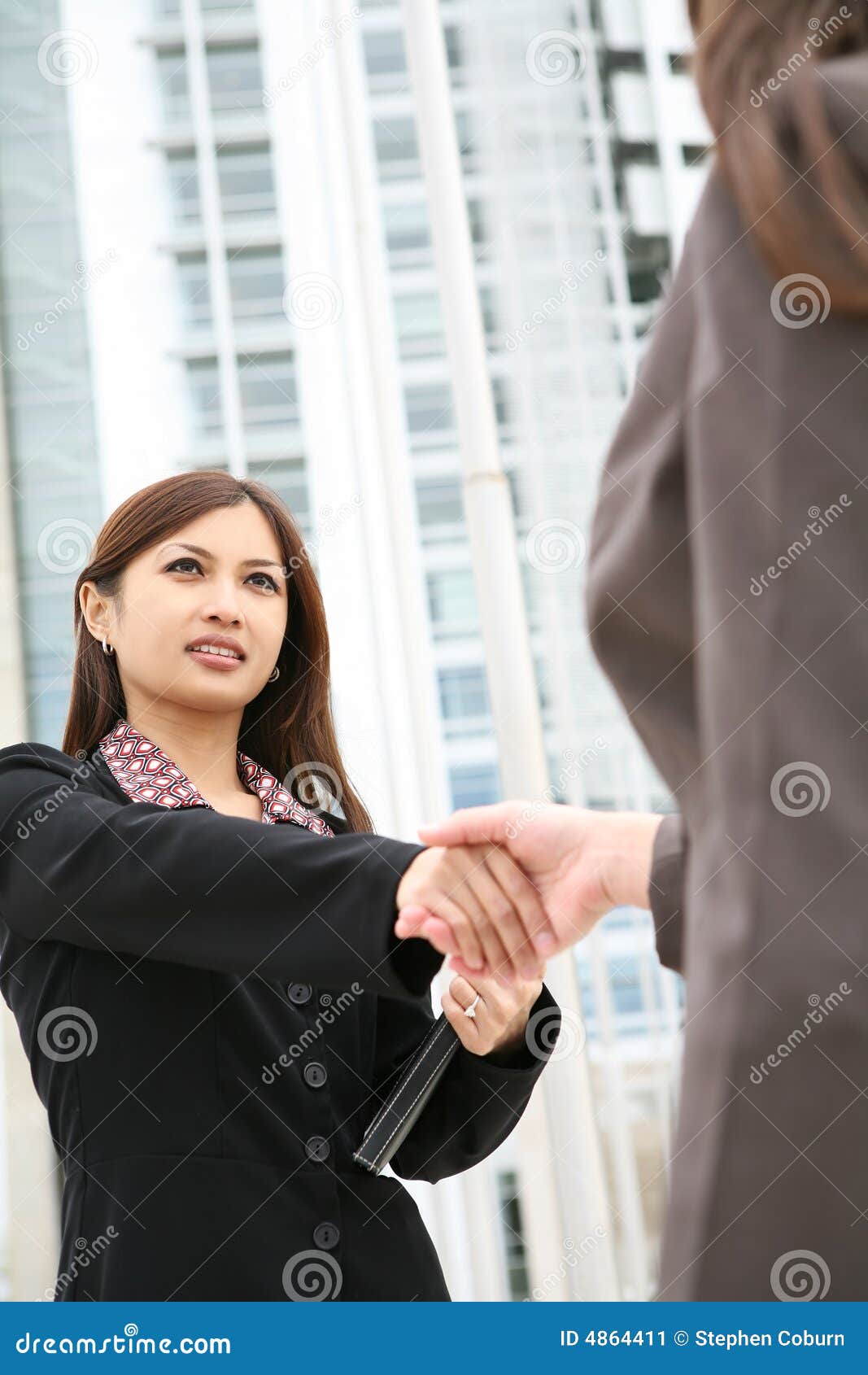 Asian Woman Handshake stock image. Image of company, beauty - 4864411