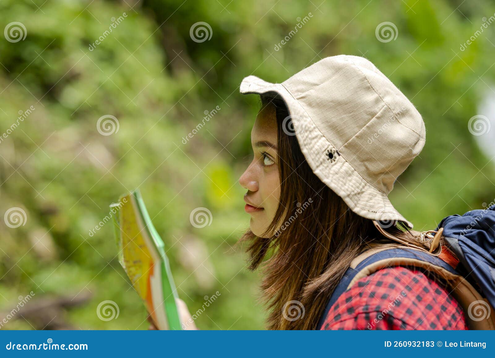 Asian Woman in a Hat and Backpack Holding Maps Stock Image - Image of ...