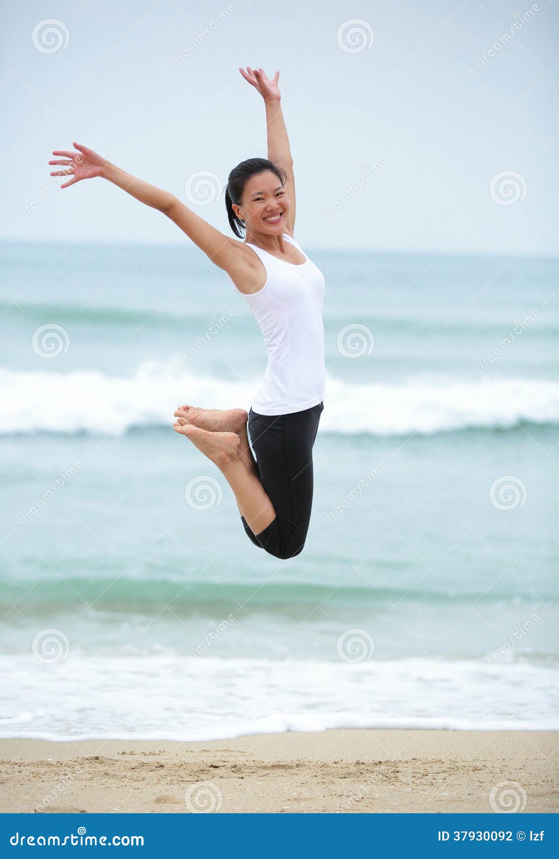 Asian woman jump on beach. stock photo. Image of happy - 37930092