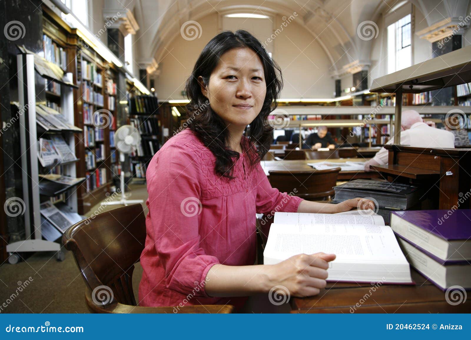 Asian woman in the library stock photo. Image of student - 20462524