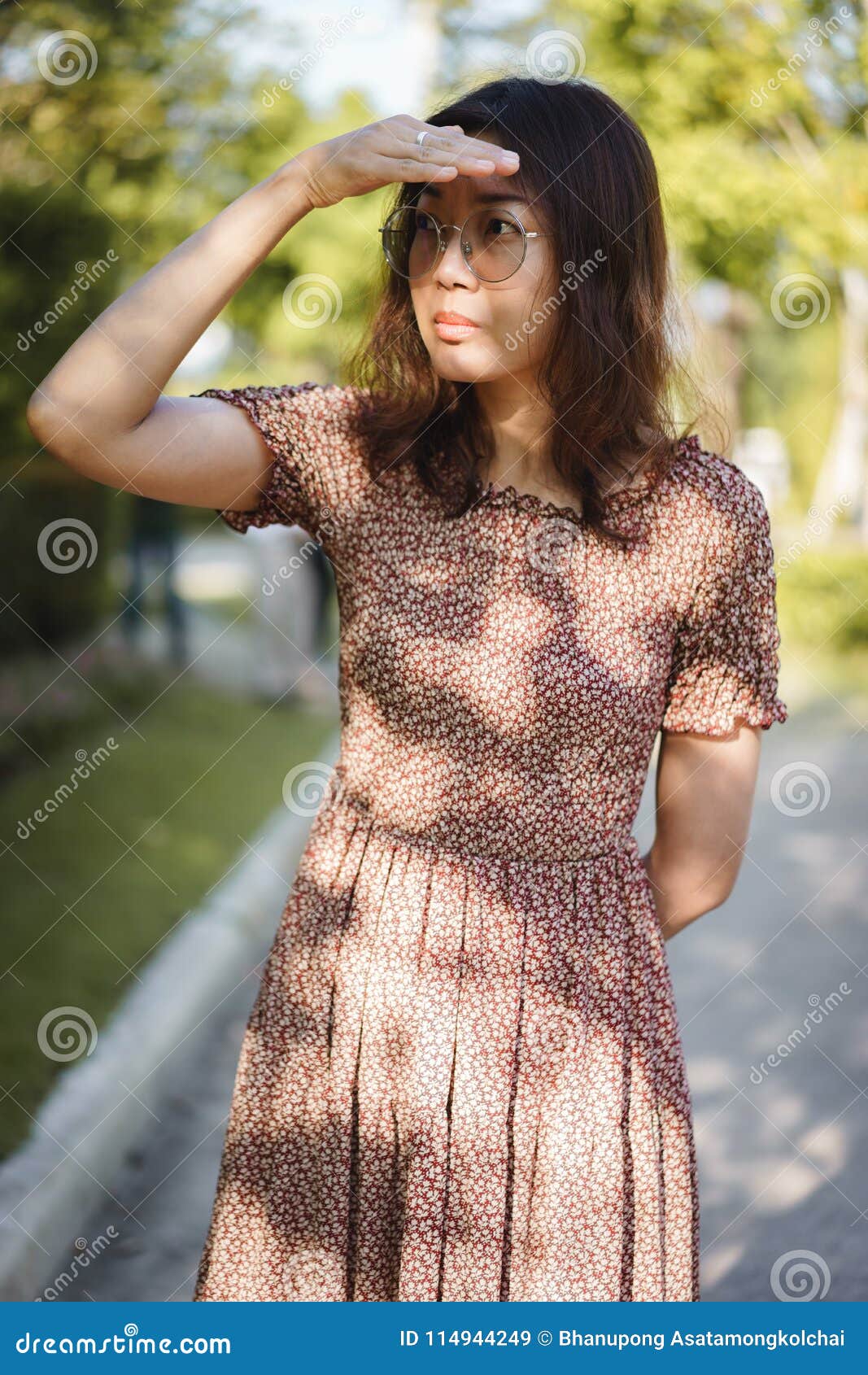 Asian Woman Looking for Someone Stock Image - Image of posing, female ...