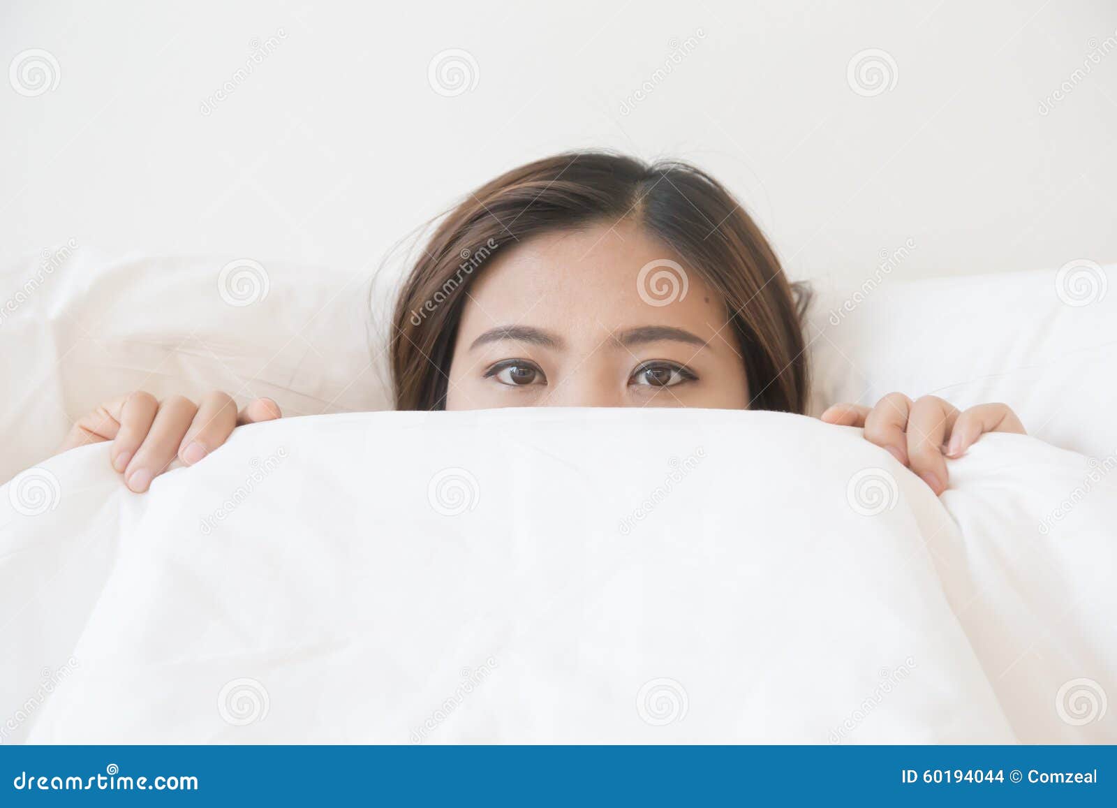 Asian Woman Lying in Bed Under Blanket Stock Photo - Image of bedroom ...