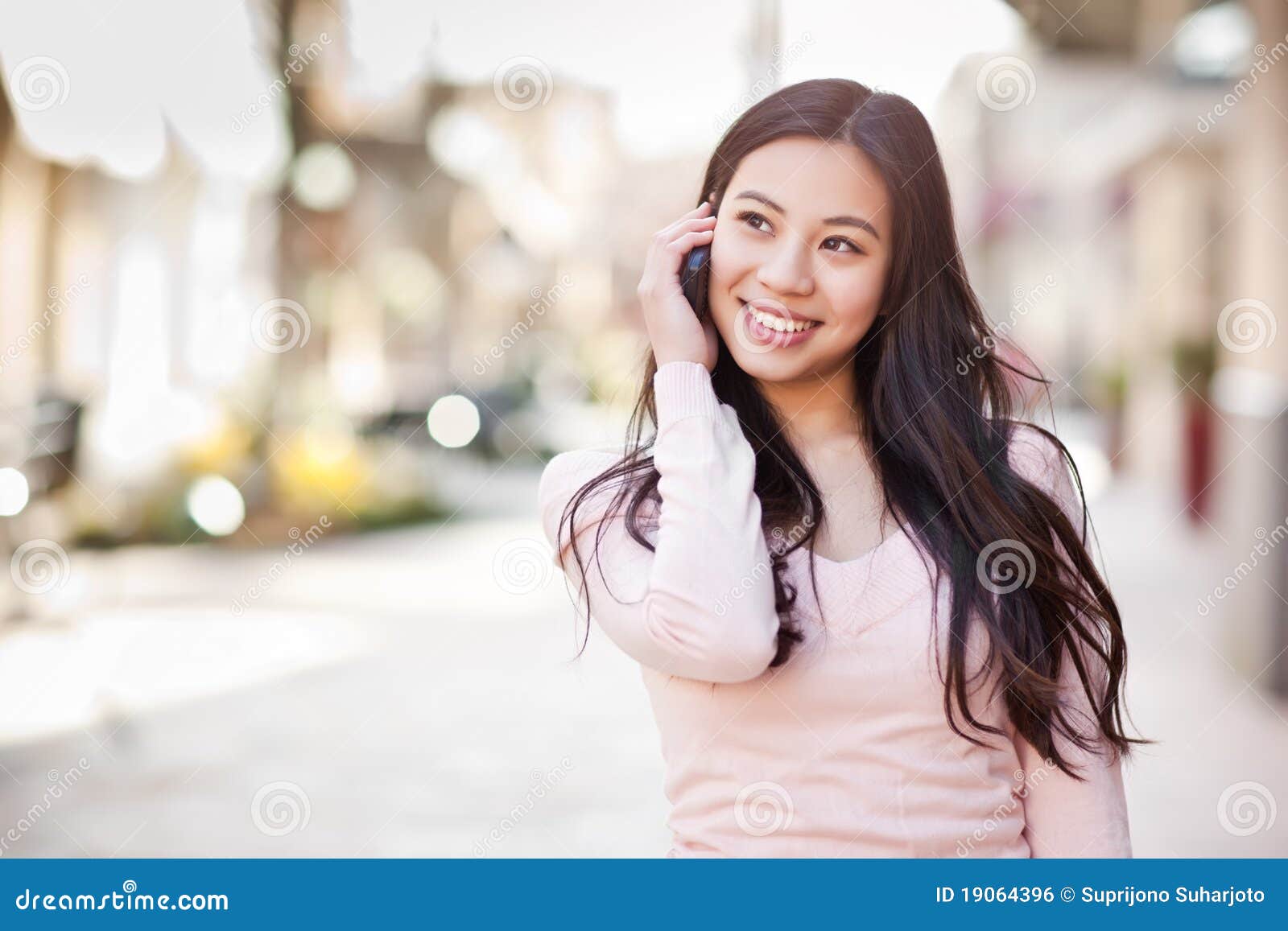 Asian woman on the phone stock photo. Image of beauty - 19064396