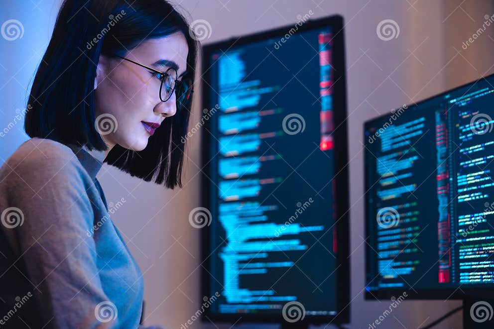 Asian Woman Software Development Working on Coding Computer Screen and Flowchart at Night in ...