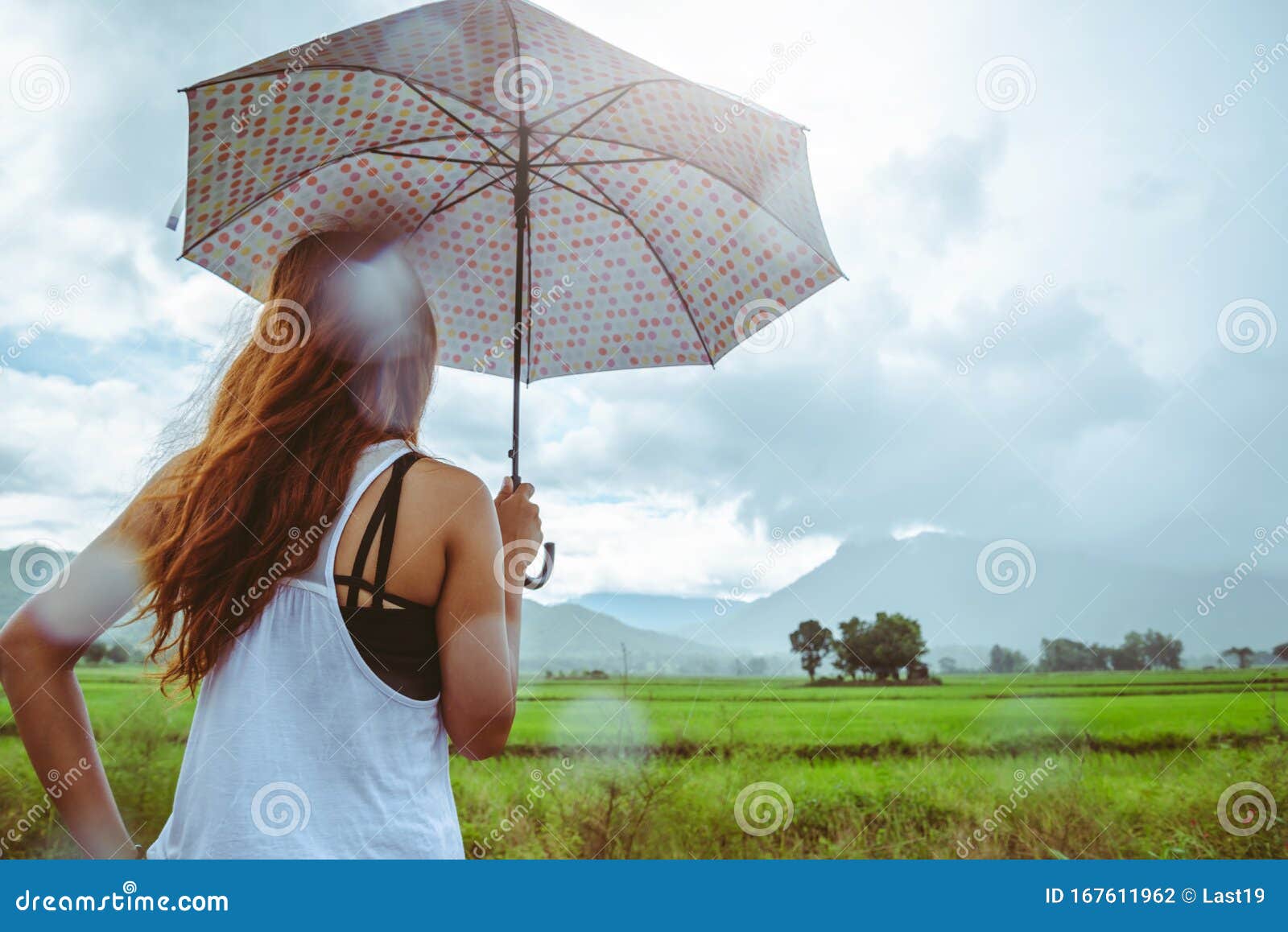 Asian Women Travel Relax In The Holiday Women Stand In Rain Umbrellas