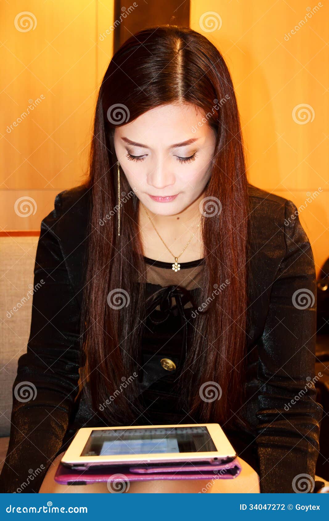 Asian woman using ipad stock photo. Image of blue, cafe - 34047272