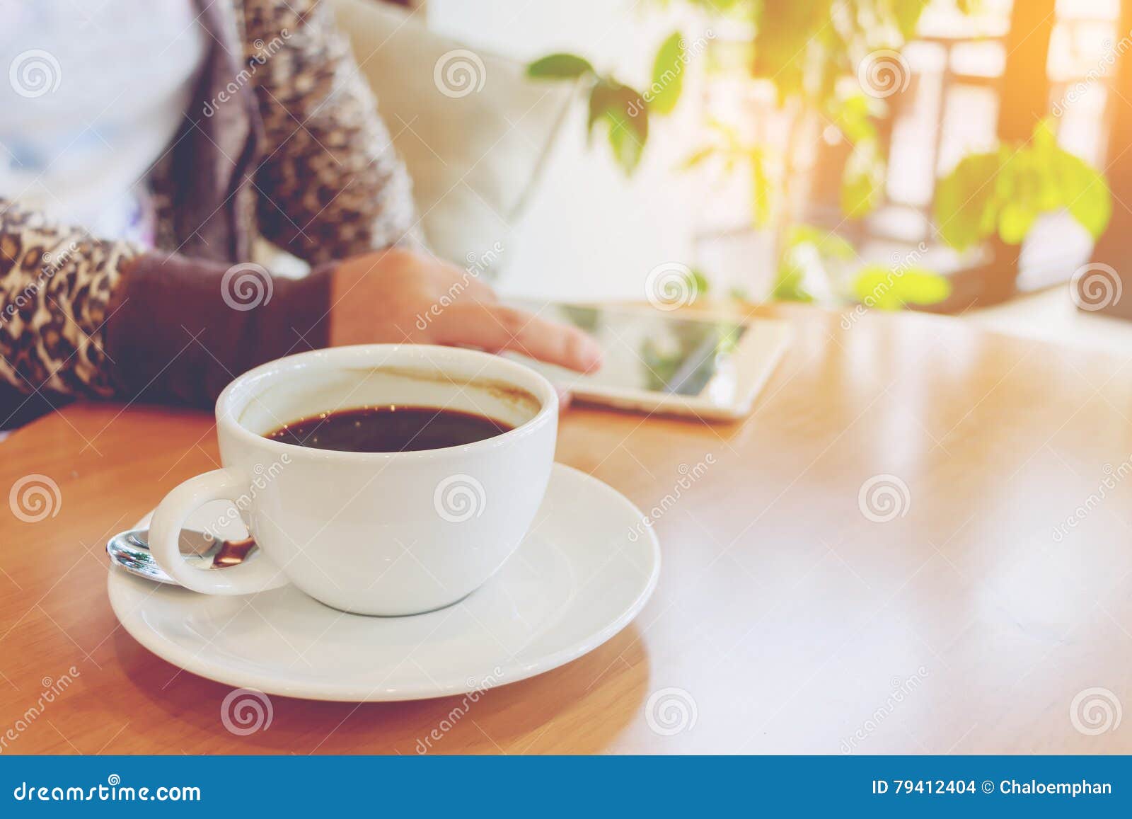Asian Woman Using Tablet Computer in Cafe Drinking Coffee. Stock Photo ...