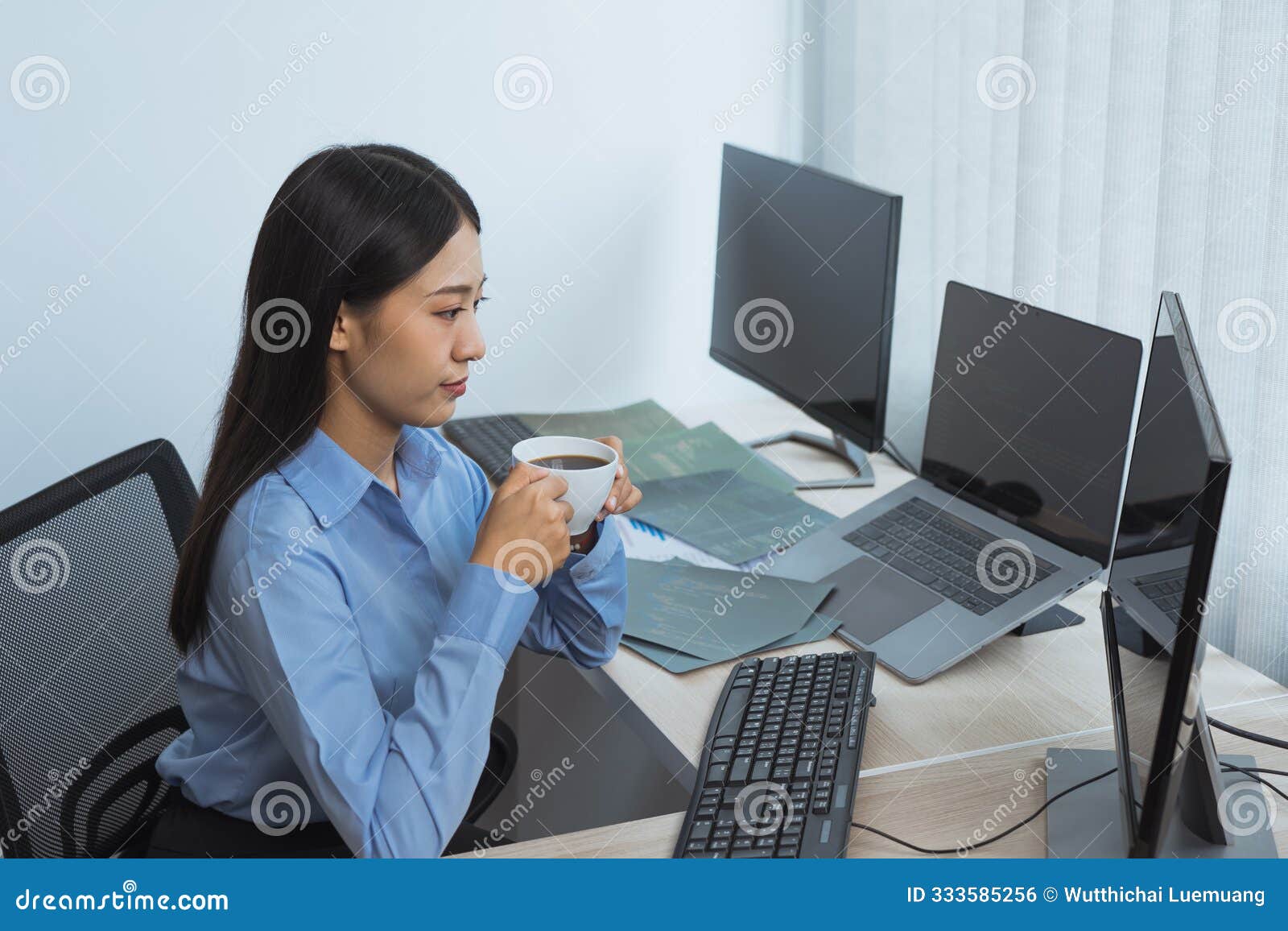 Asian Woman Was Drinking Coffee in the Early Morning while Contemplating the Program and Code on ...
