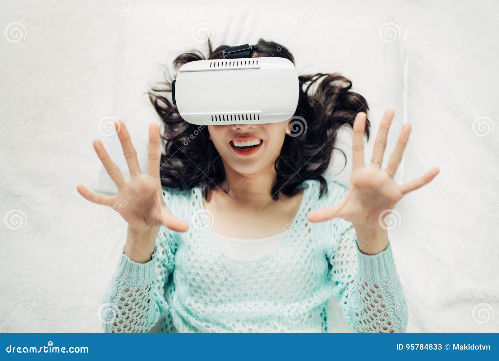 Asian Woman Wearing Vr Goggles Lying on Bed. Stock Image - Image of ...