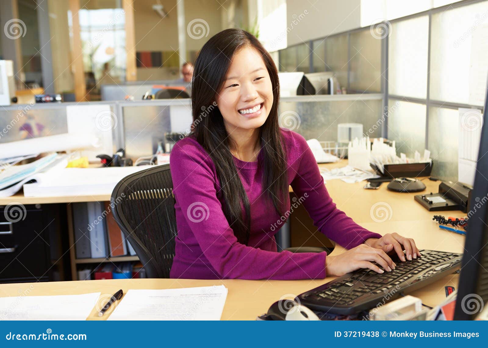 Asian Woman Working at Computer in Modern Office Stock Photo - Image of ...