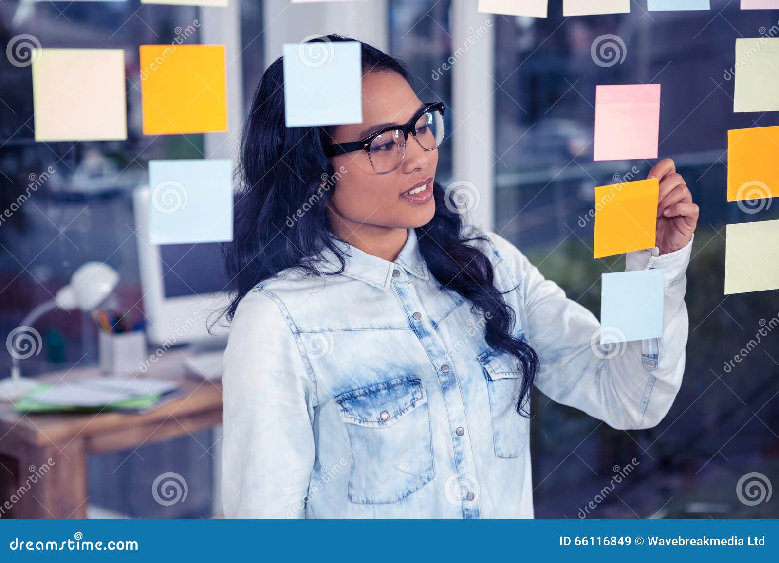 Asian Woman Writing on Sticky Notes Stock Image - Image of ...