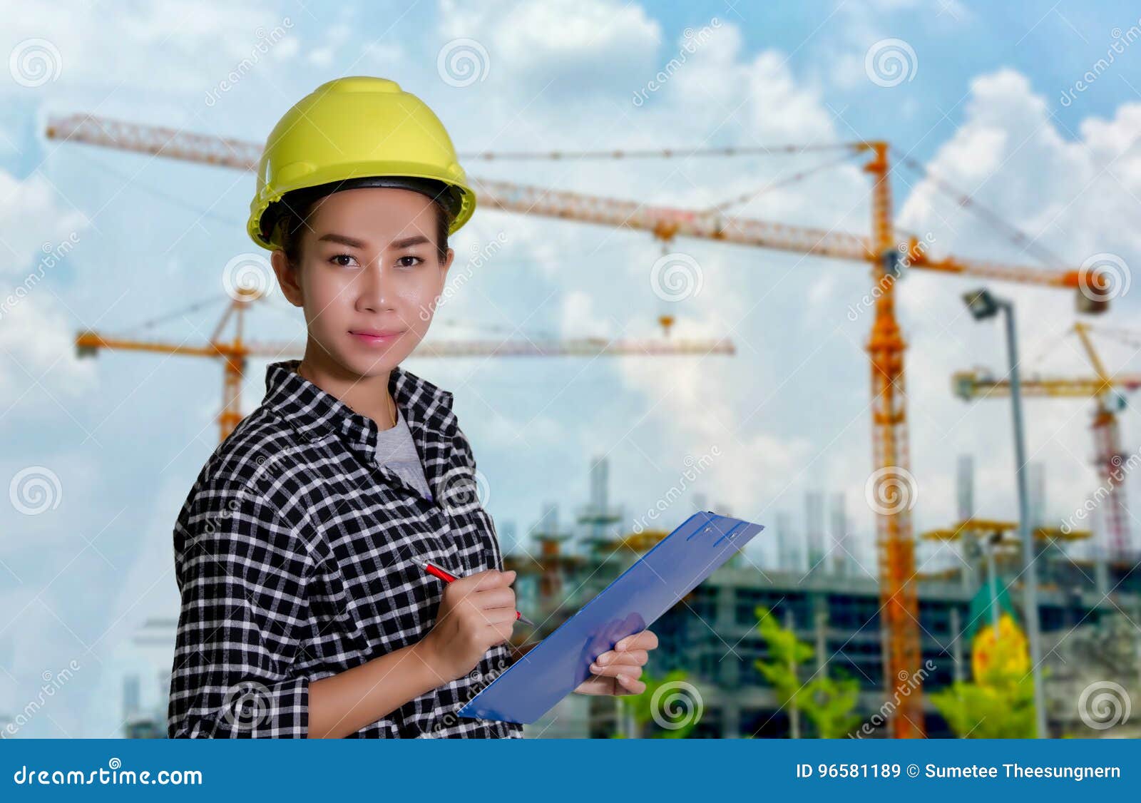 Asian Women Engineers and Technicians are Checking the List on the ...