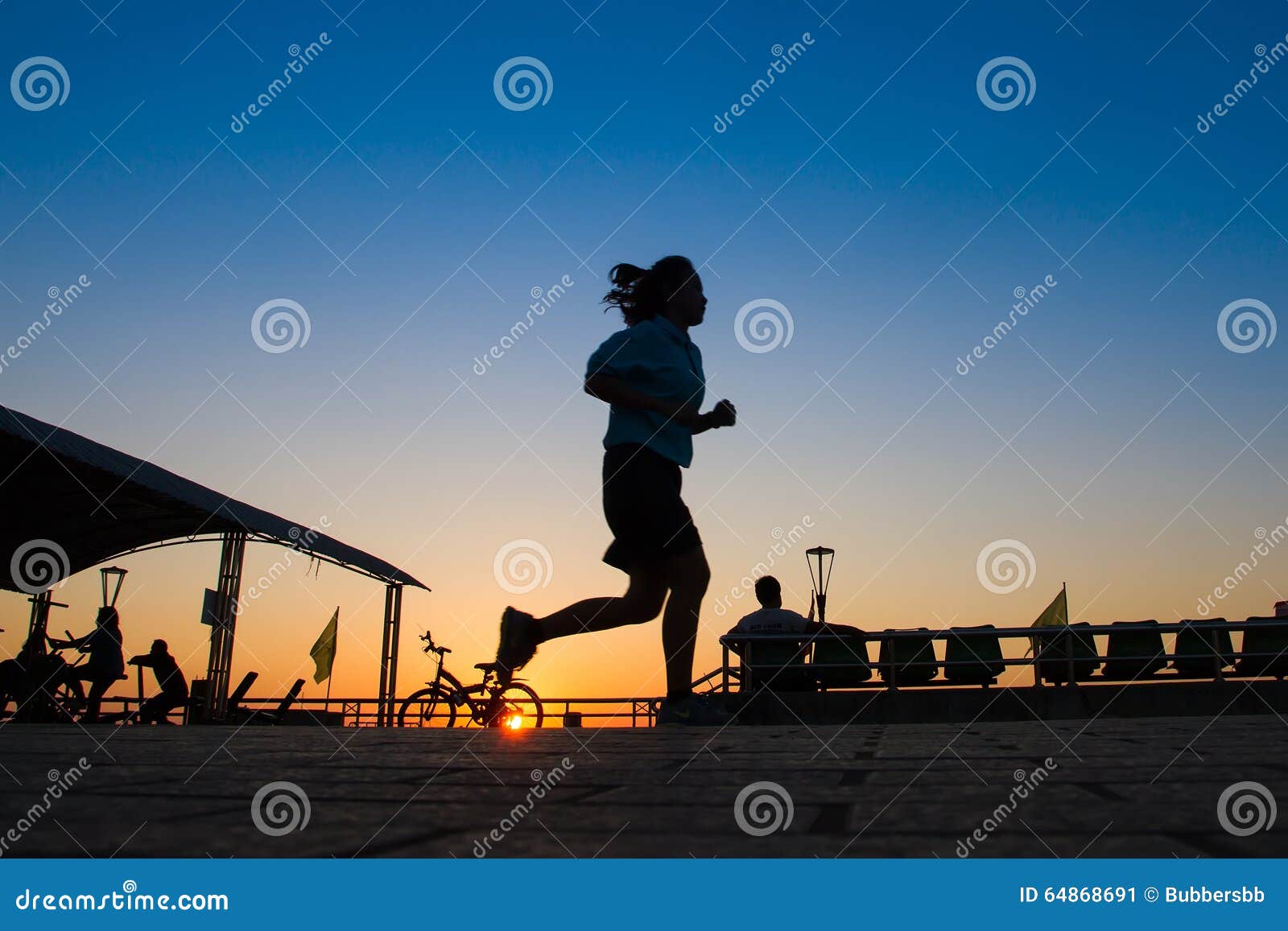 Asian Women are Silhouette Jogging at a Speed in the Evening. Stock ...