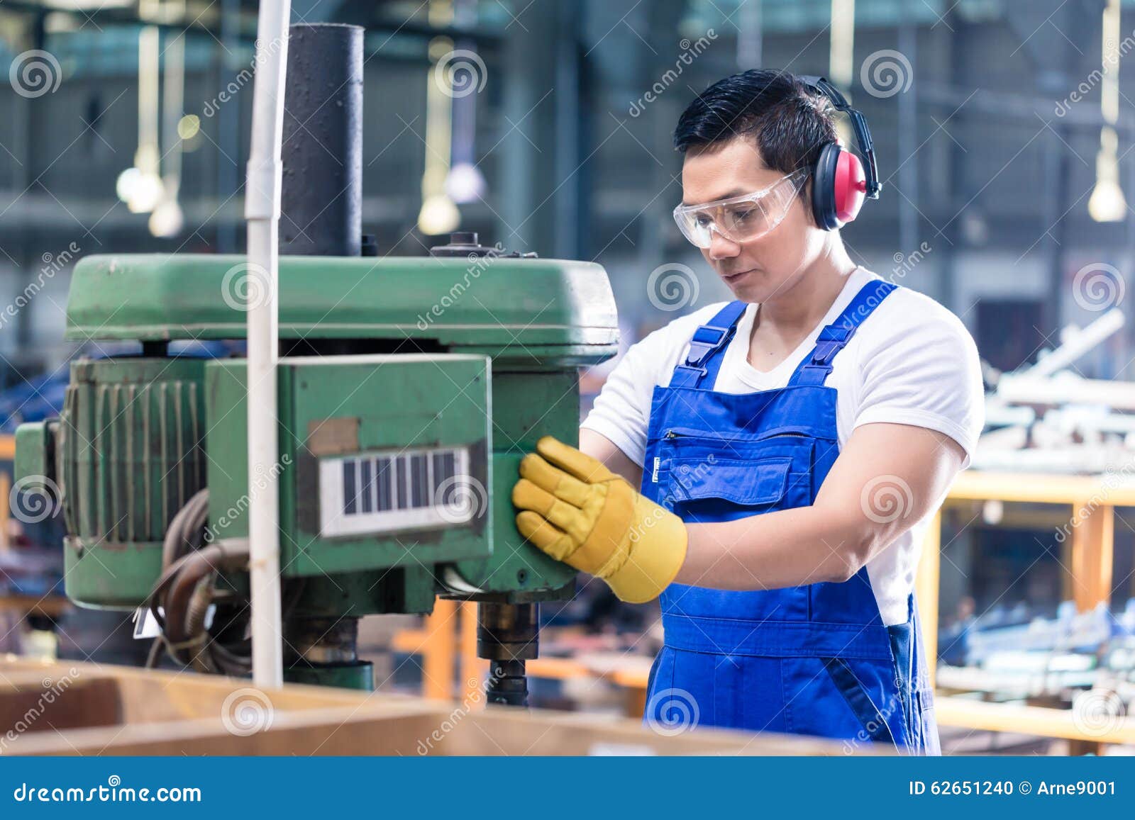 Asian Worker in Factory on Drilling Machine Stock Photo - Image of ...
