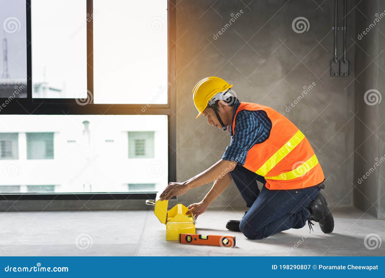 Asian Worker Opening Tool Boxes in Construction Site Stock Image ...