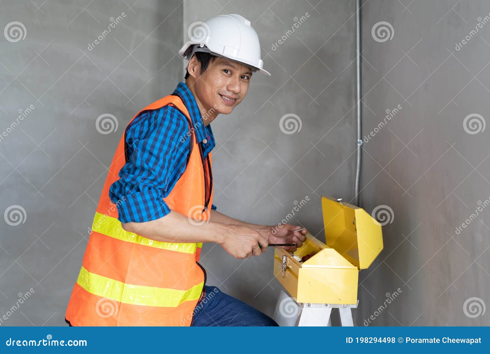Asian Worker Opening Tool Boxes in Construction Site Stock Photo ...