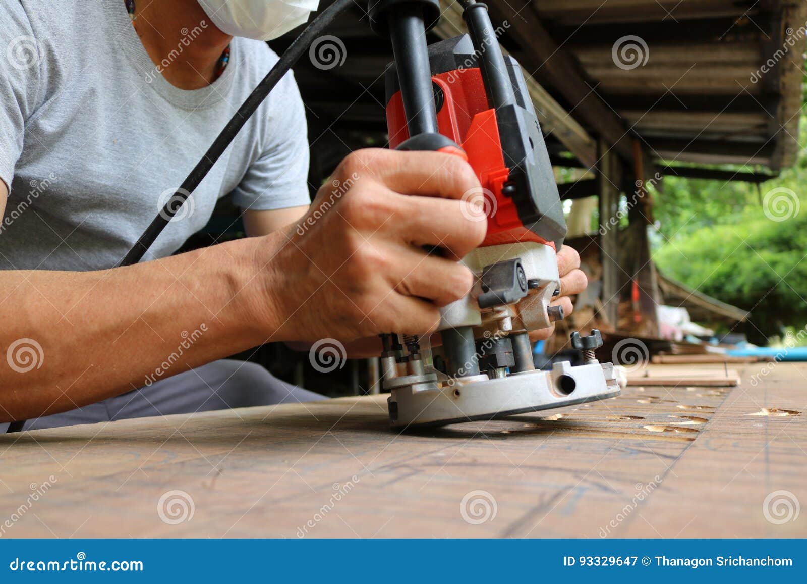 Asian Workers Using Electric Routering To Cut the Wood. Stock Image ...