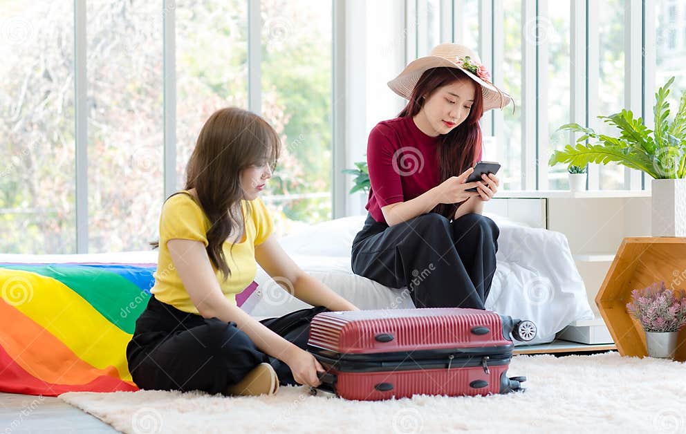 Asian Young Cheerful Female Lesbian Lover Couple Girlfriend In Casual Traveling Outfit Preparing